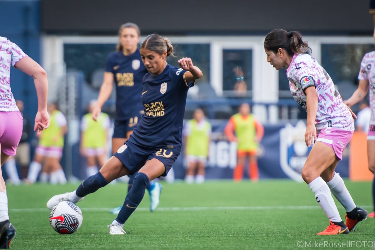 Reign extend Sam Meza, loan her to Dallas